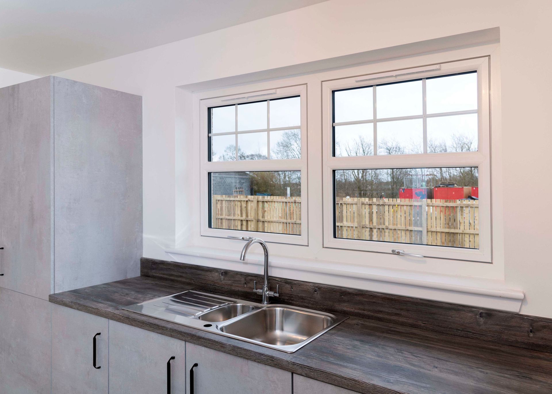 Pivot Windows - Fully Reversible PVCu Window System - REHAU